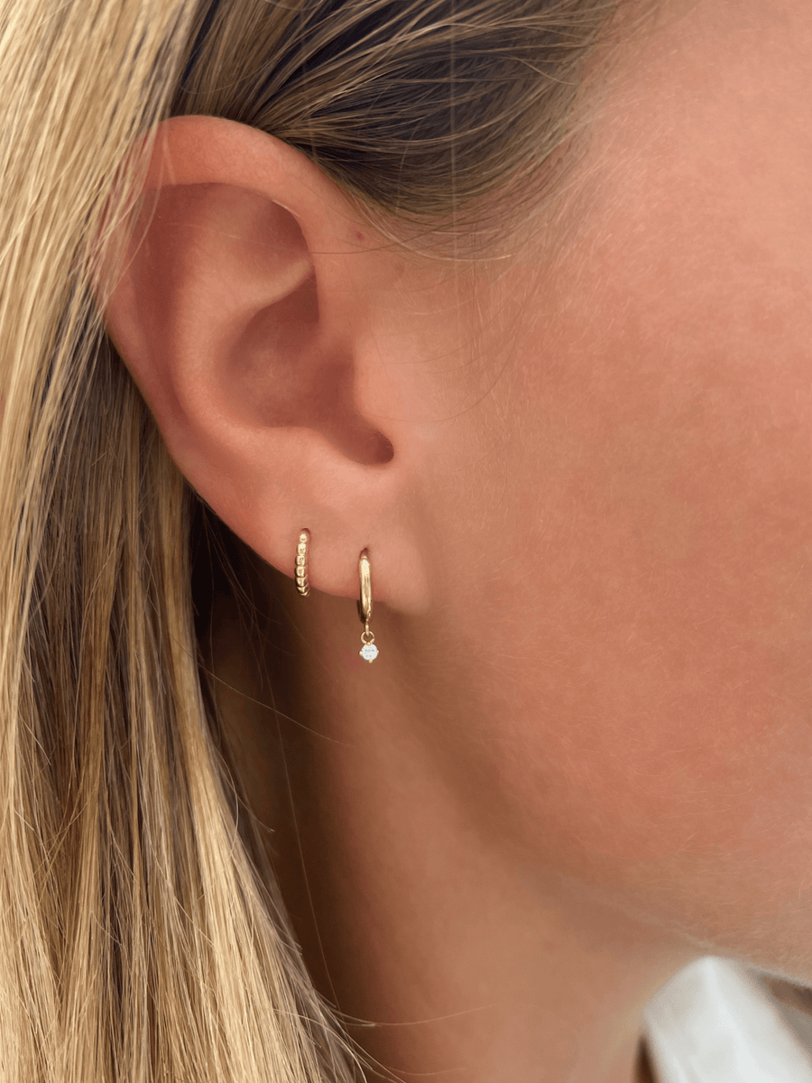 Charmed hoop earrings store